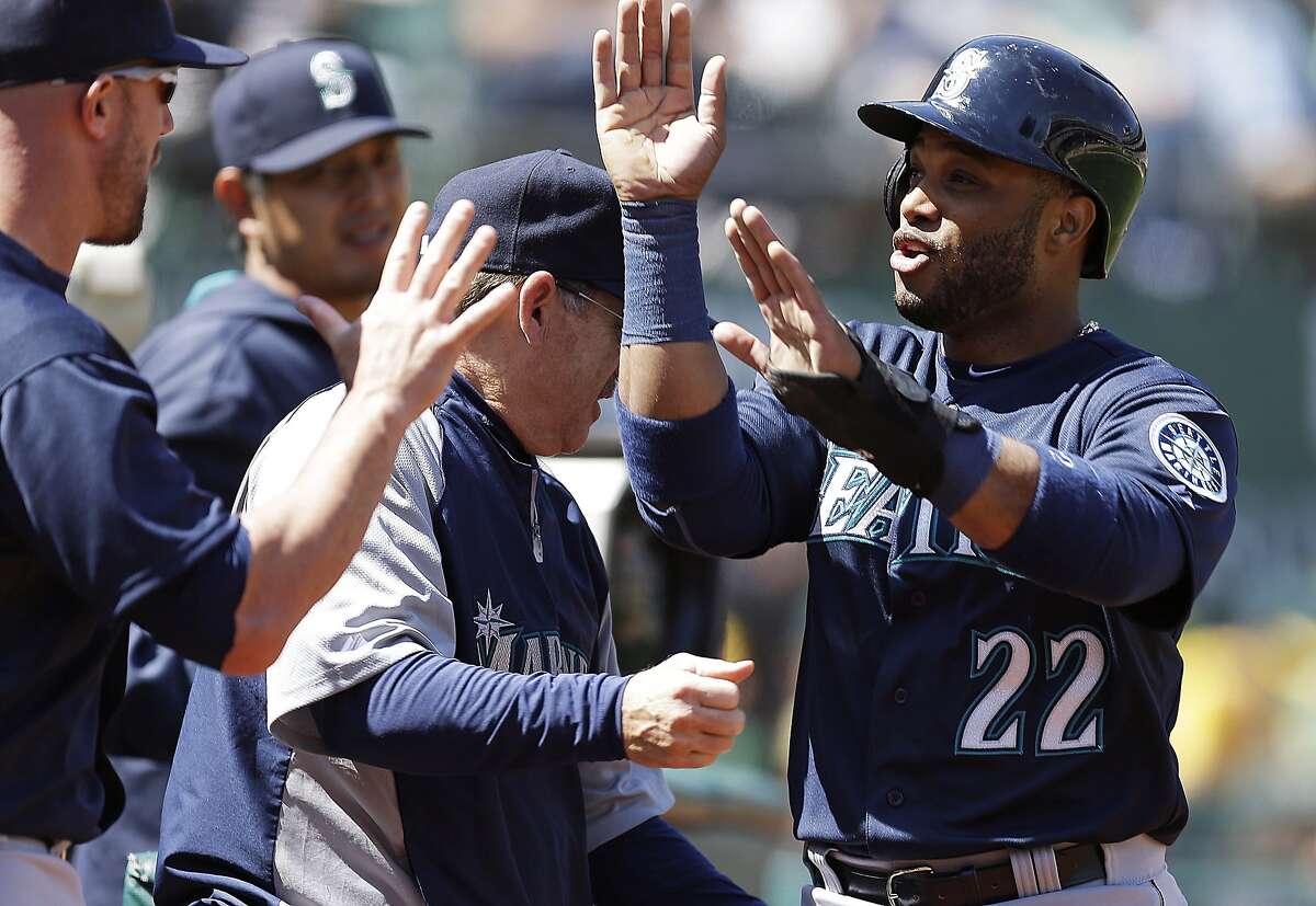 A's rally to beat Seattle 6-3