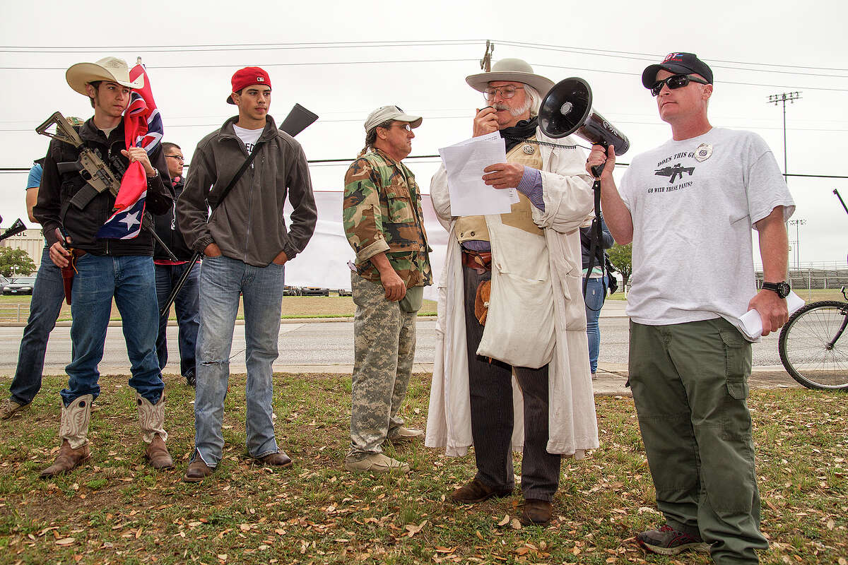 Open-carry protestors rally at police substation