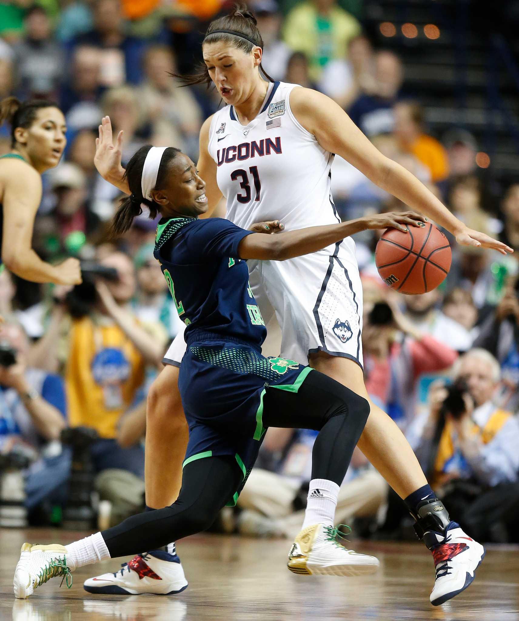 Connecticut routs Notre Dame for rare championship double-dip