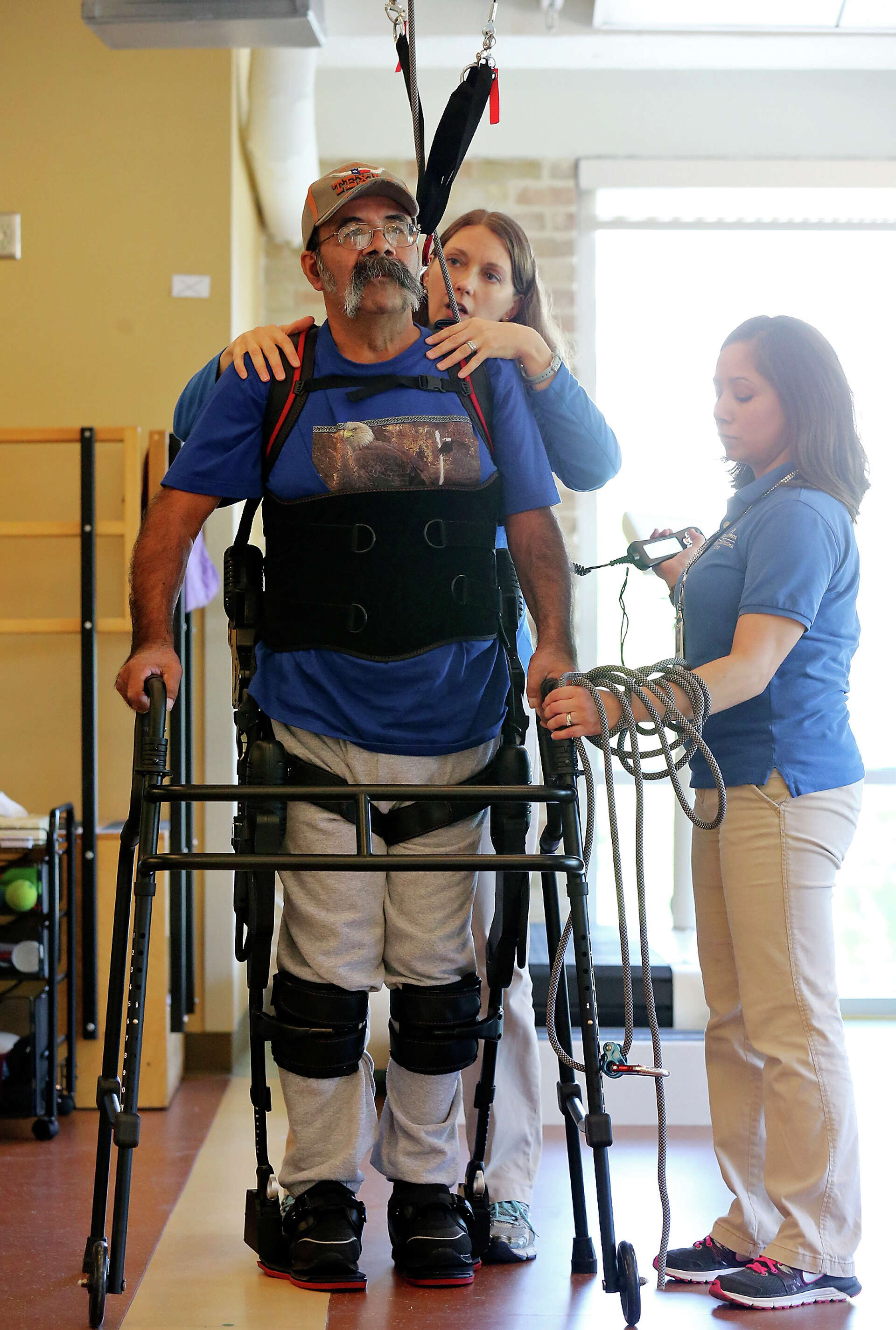 Bionic legs help some patients walk again