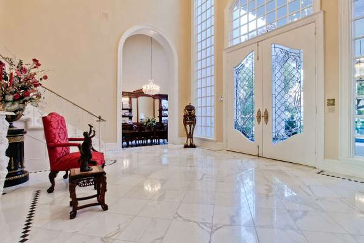 Pink Mary Kay mansion in Dallas sells for significantly less than ...