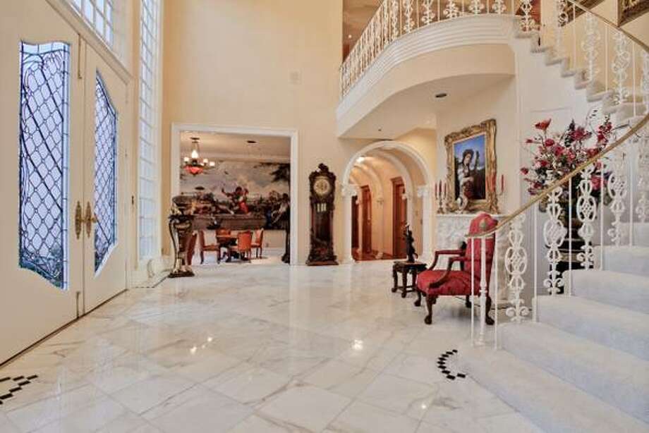 Pink Mary Kay mansion in Dallas sells for significantly less than ...