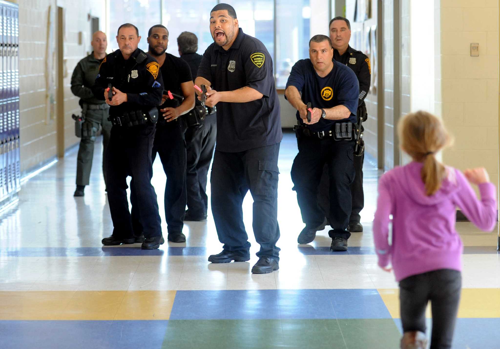 Cops, with kids, train for school crises