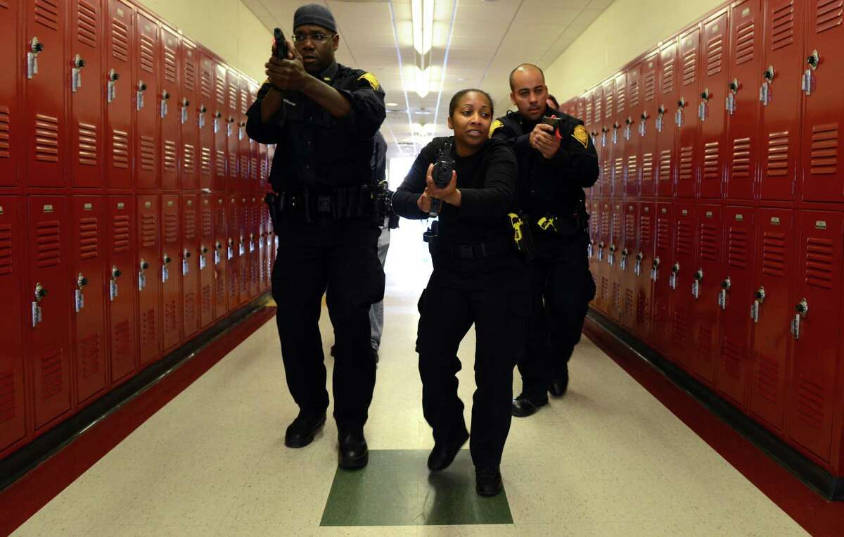 Cops, with kids, train for school crises