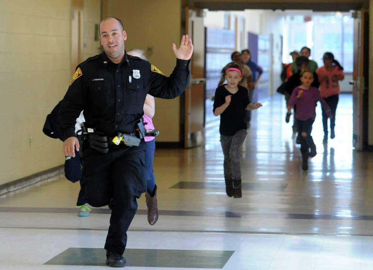 Cops, with kids, train for school crises