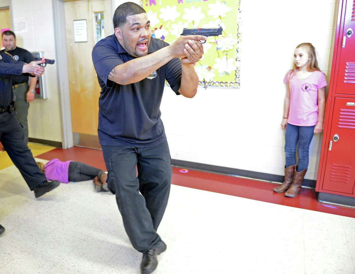 Cops, with kids, train for school crises