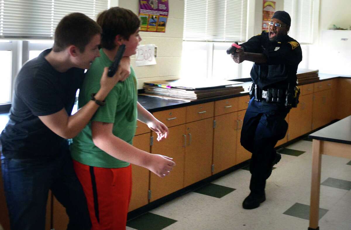 Cops, with kids, train for school crises