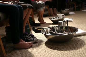 Pelosi assists in Holy Week foot-washing ritual