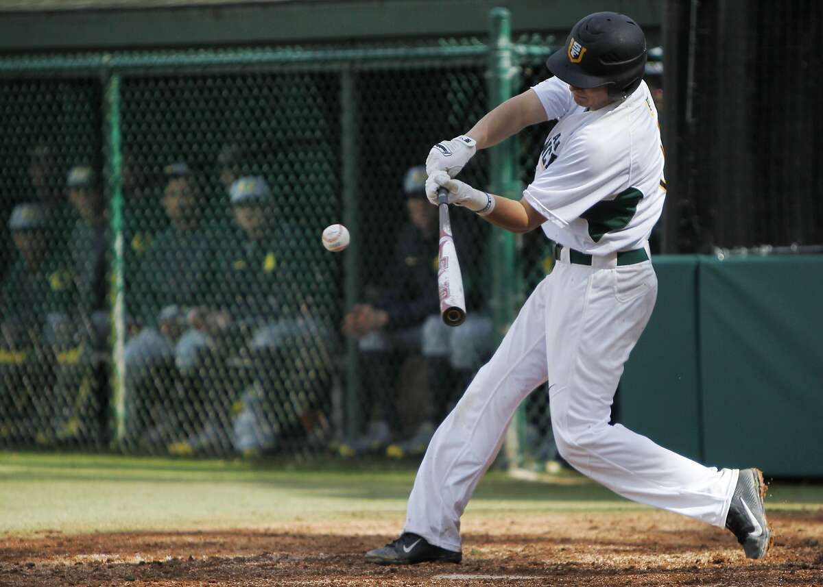 USF's Nino Giarratano embraces coaching son, Nico