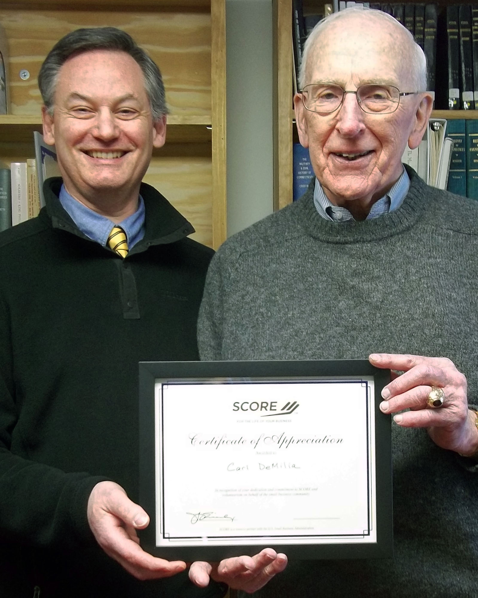 Business executives honor ex-library director