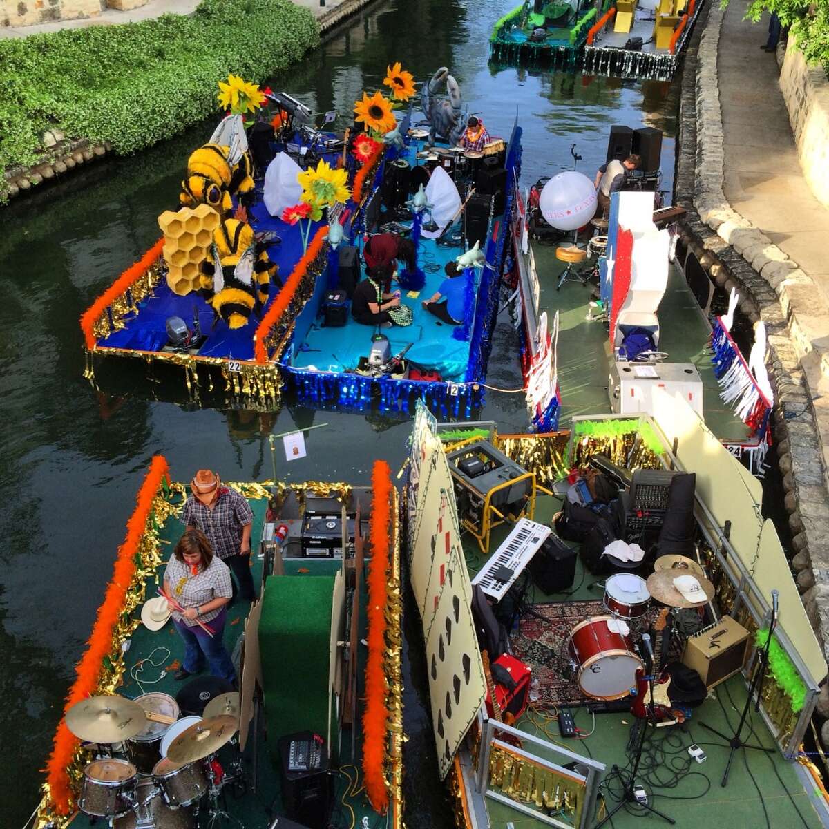Crowds flock to River Walk for Fiesta's first parade