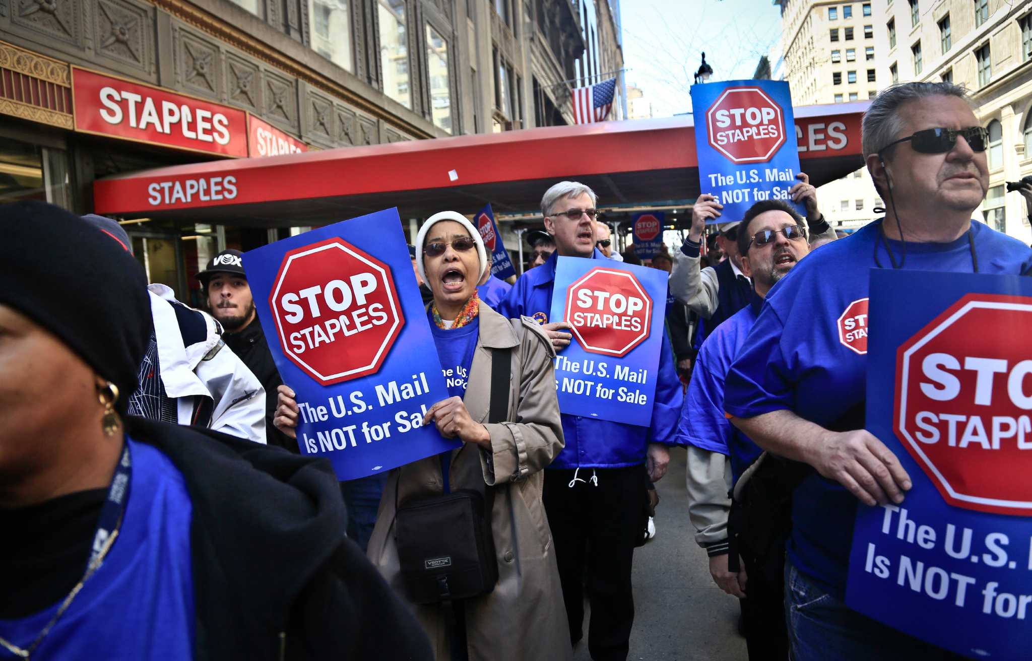 Postal unions against Staples