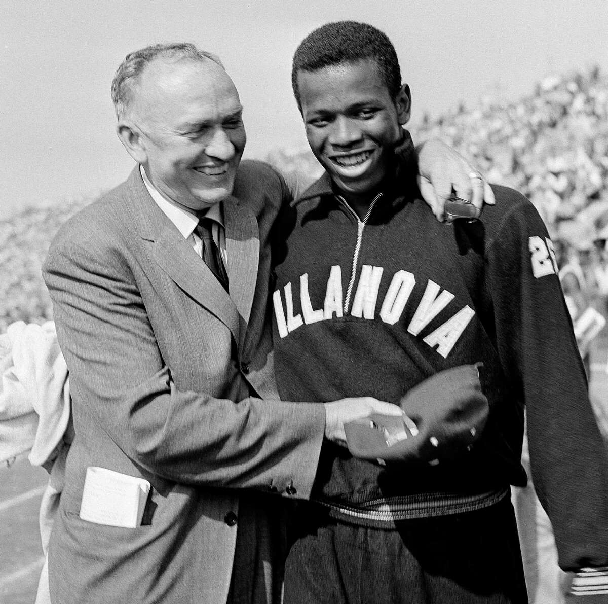 Olympian Budd set world record in 100-yard dash