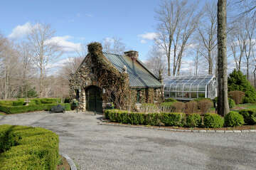 Director Howard's Conyers Farm house on the market