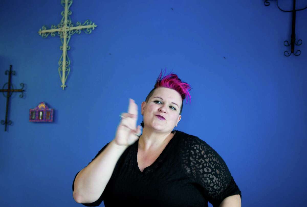 Sign language interpreter helps deaf audiences enjoy music, dirty ...