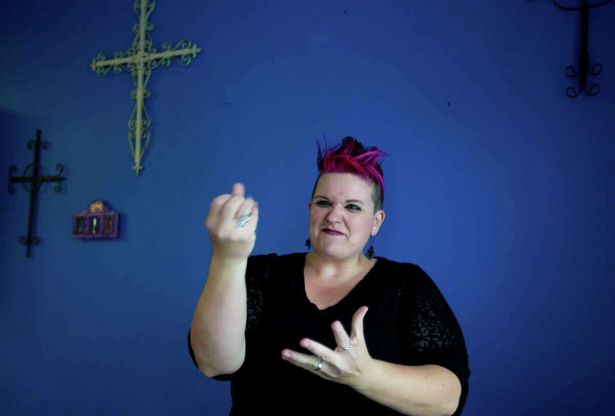 Sign language interpreter helps deaf audiences enjoy music, dirty ...