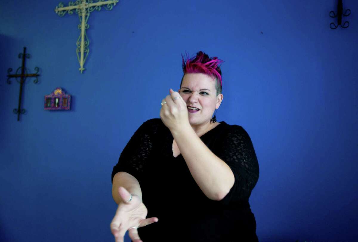 Sign language interpreter helps deaf audiences enjoy music, dirty ...