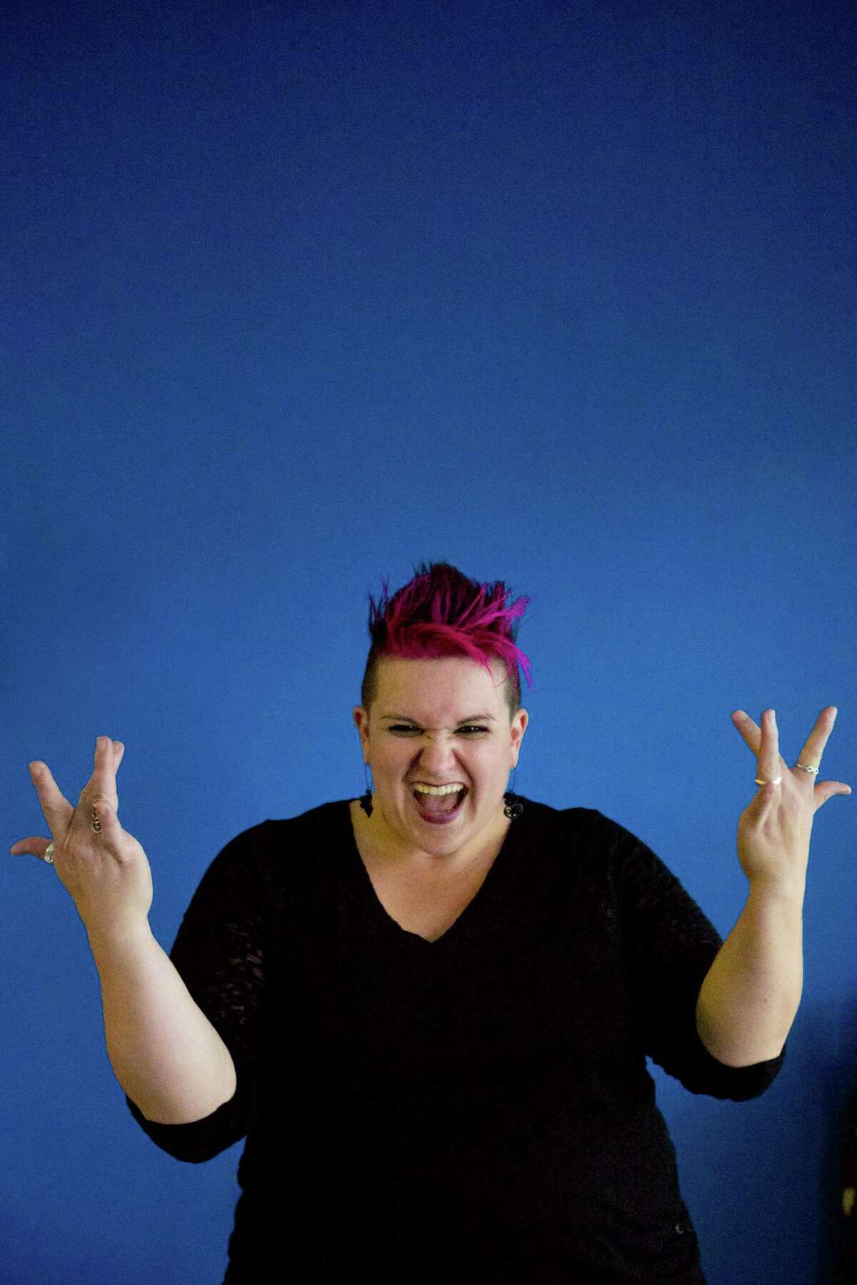 Sign language interpreter helps deaf audiences enjoy music, dirty ...