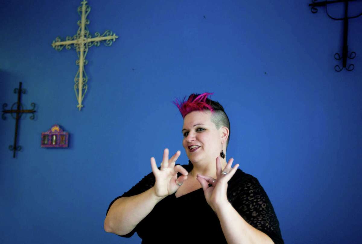 Sign language interpreter helps deaf audiences enjoy music, dirty ...
