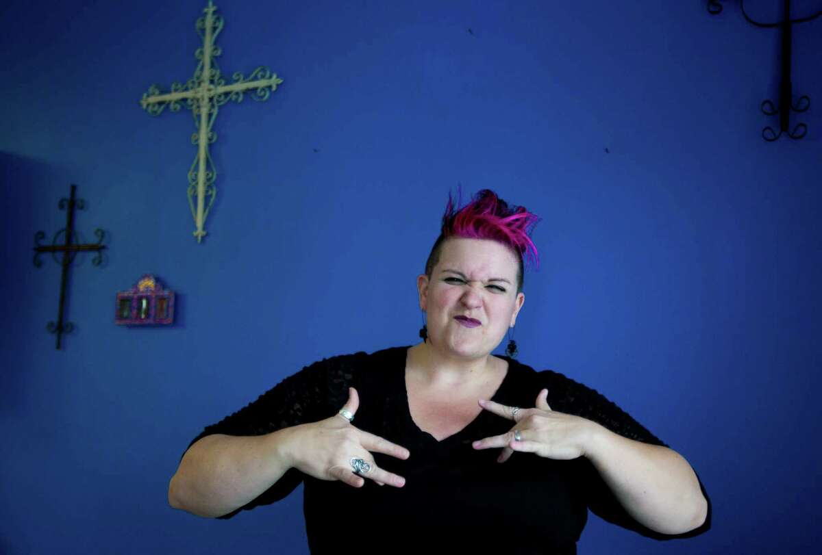 Sign language interpreter helps deaf audiences enjoy music, dirty ...