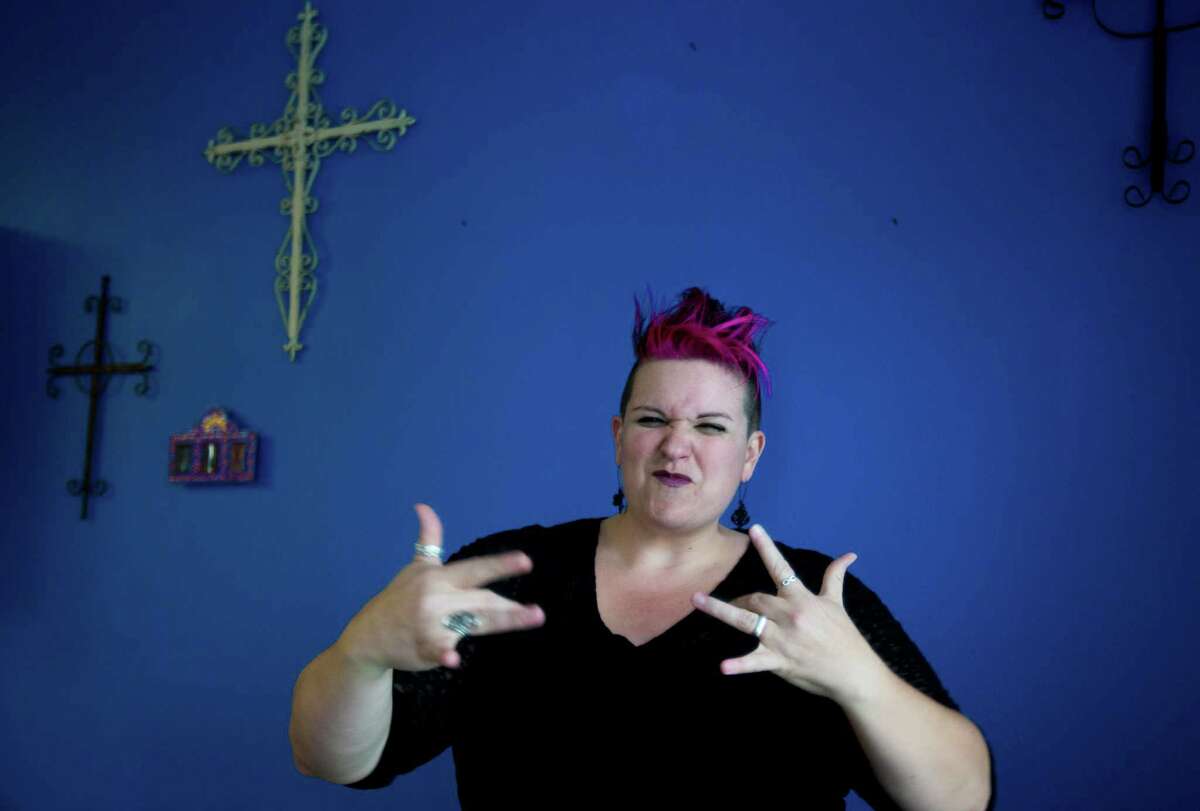 Sign language interpreter helps deaf audiences enjoy music, dirty ...