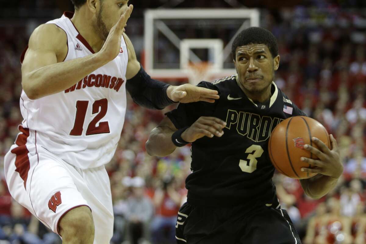 Former Purdue point guard Ronnie Johnson signs with UH
