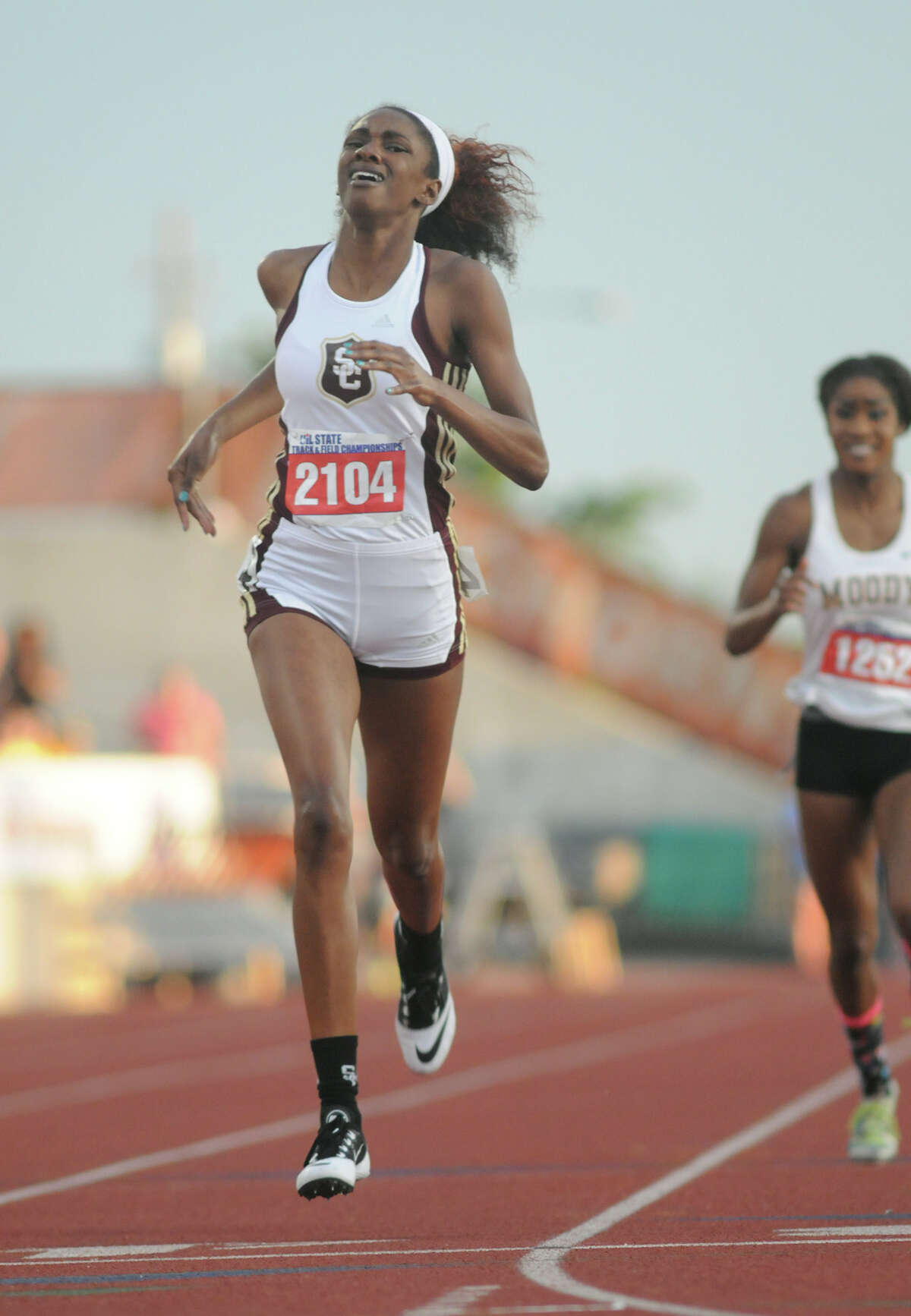 Legally blind pole vaulter soars as role model at state meet