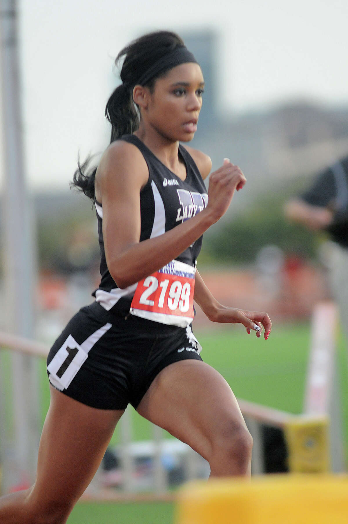 Legally blind pole vaulter soars as role model at state meet