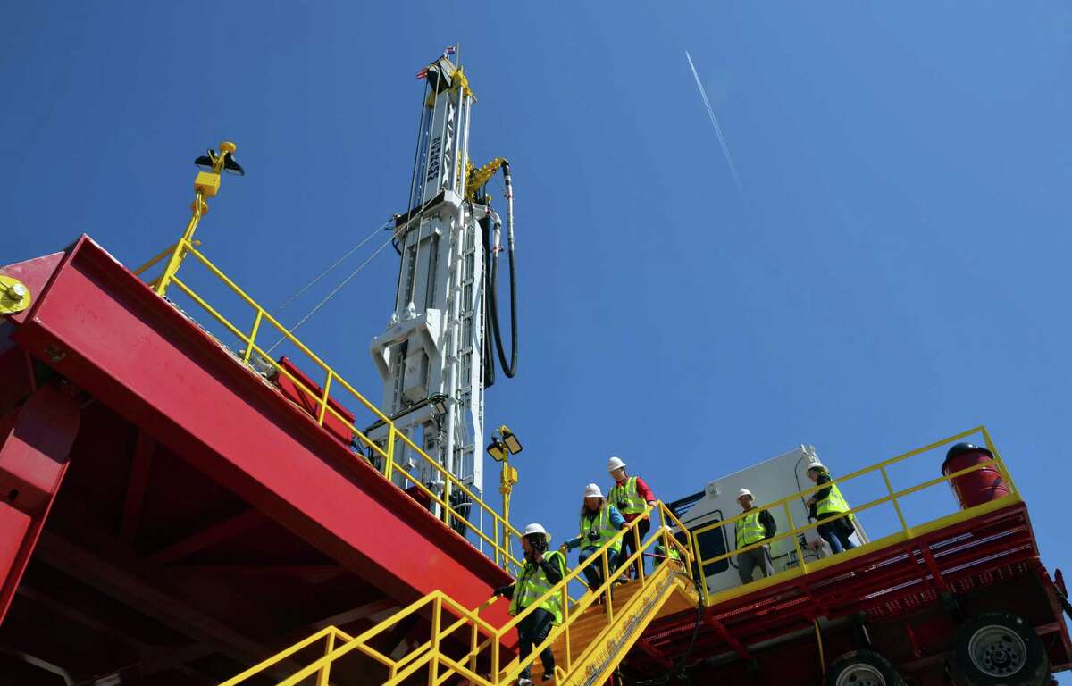 Century-old water driller's new rigs walk into oil field service