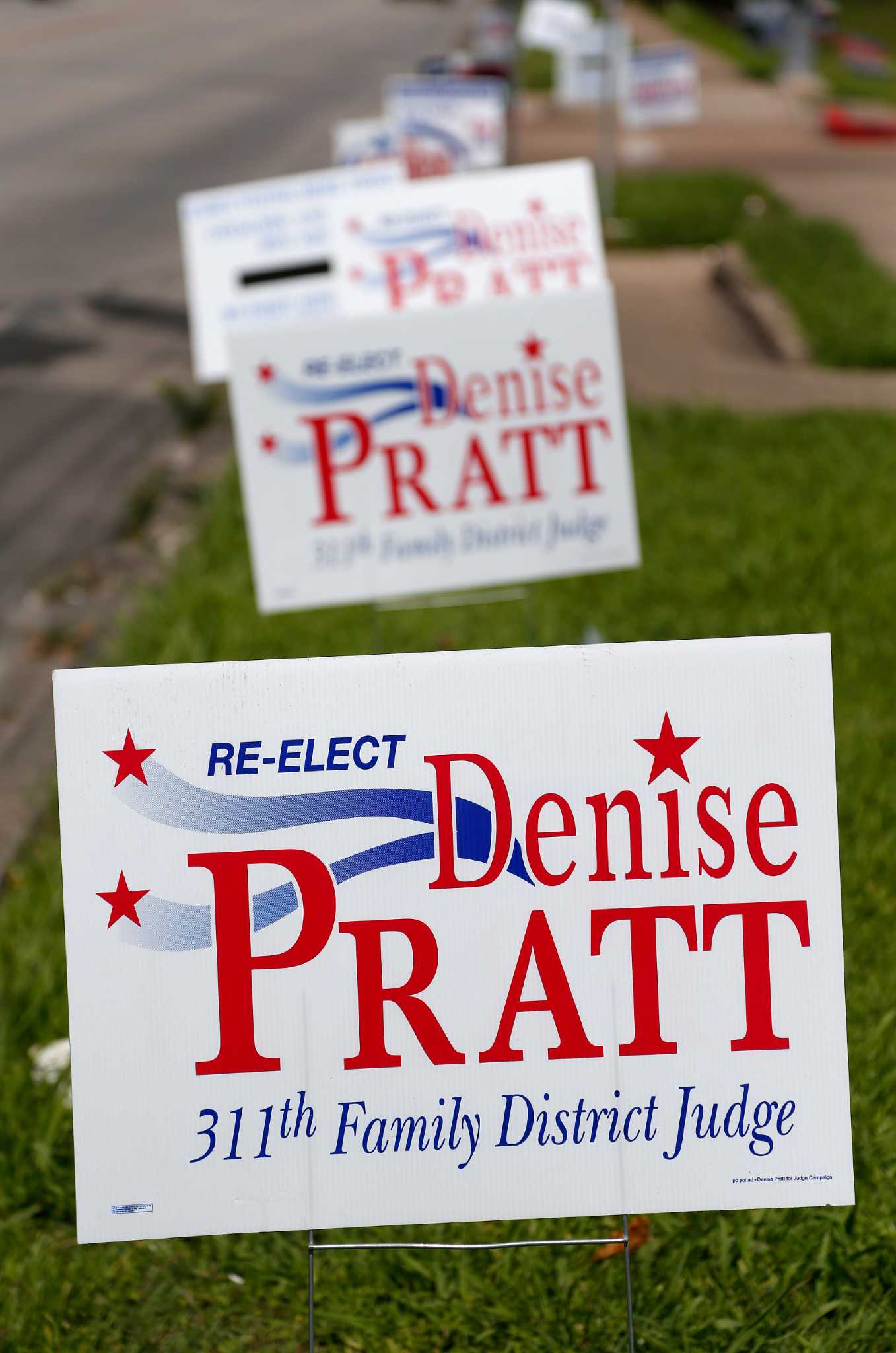 Campaign signs for resigned judge spotted at early voting sites