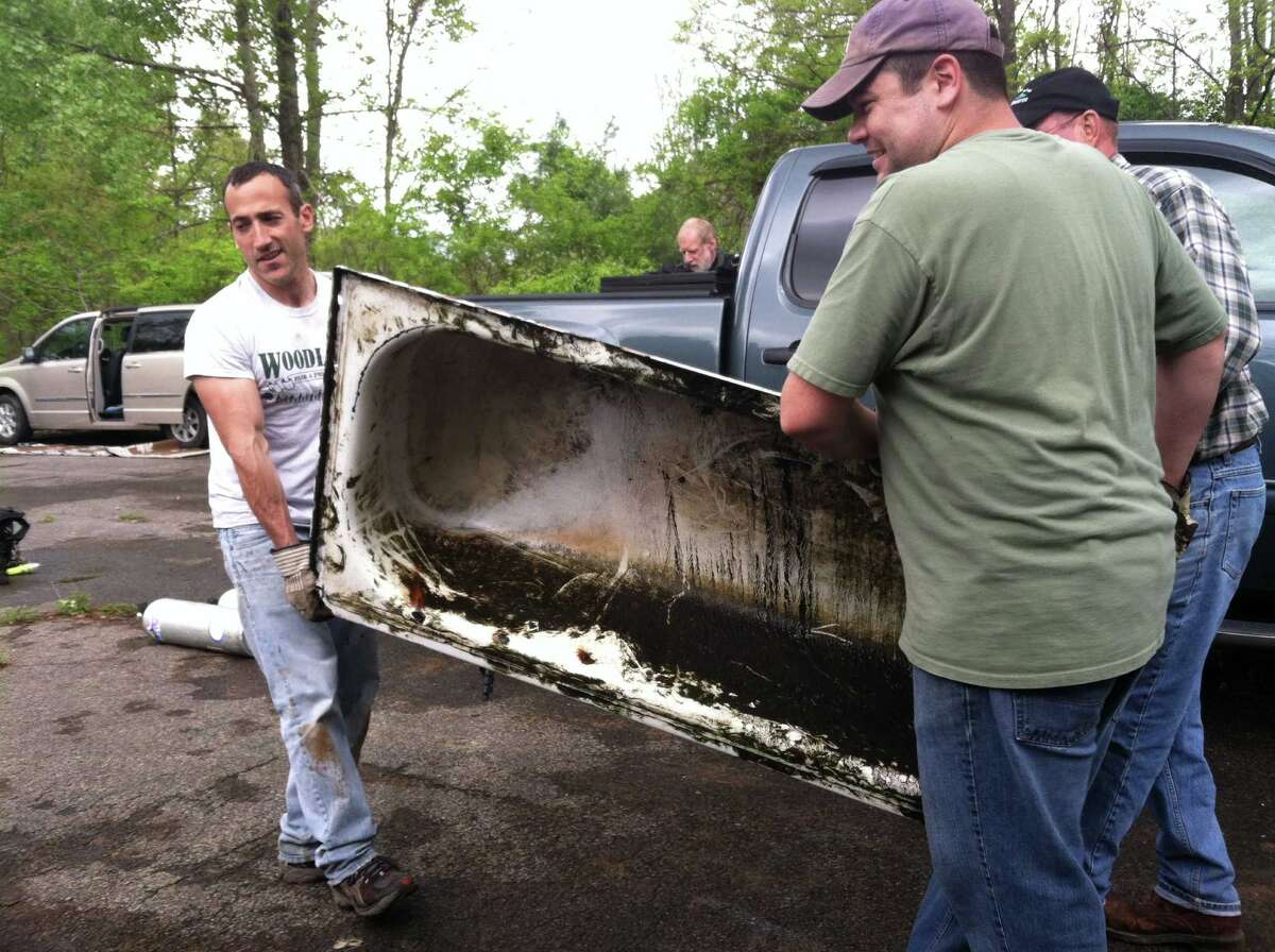 Divers drag debris from Schenectady's Woodlawn Preserve pond