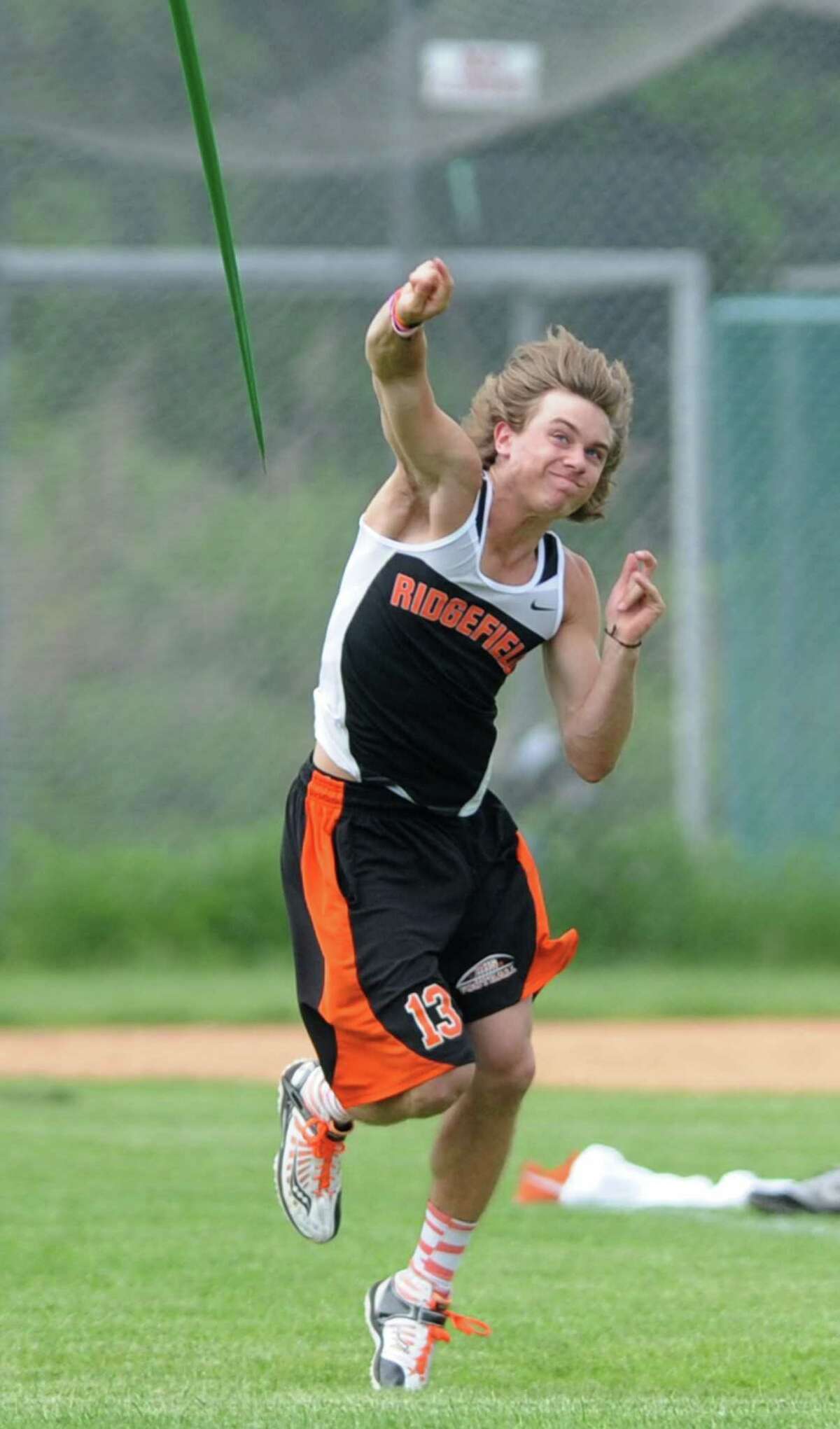 Danbury boys, Darien girls currently in first place at FCIAC track and ...