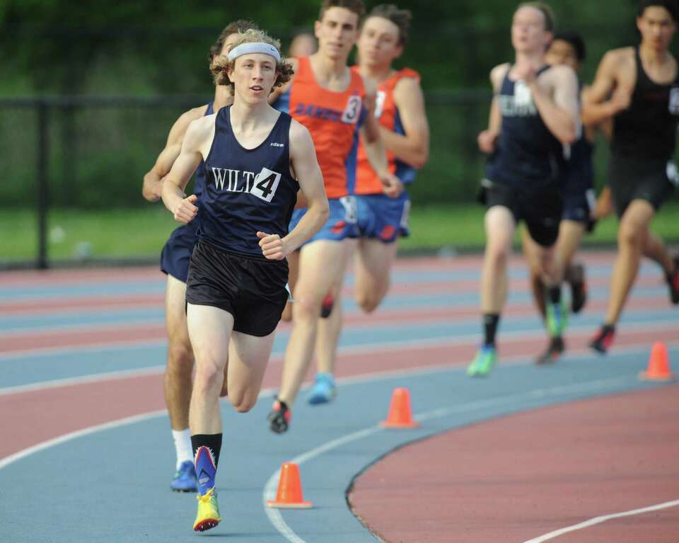 Danbury boys, Darien girls currently in first place at FCIAC track and ...