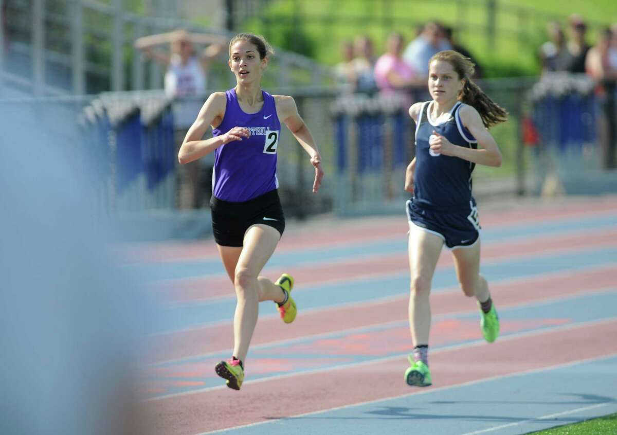 Danbury boys, Darien girls currently in first place at FCIAC track and ...