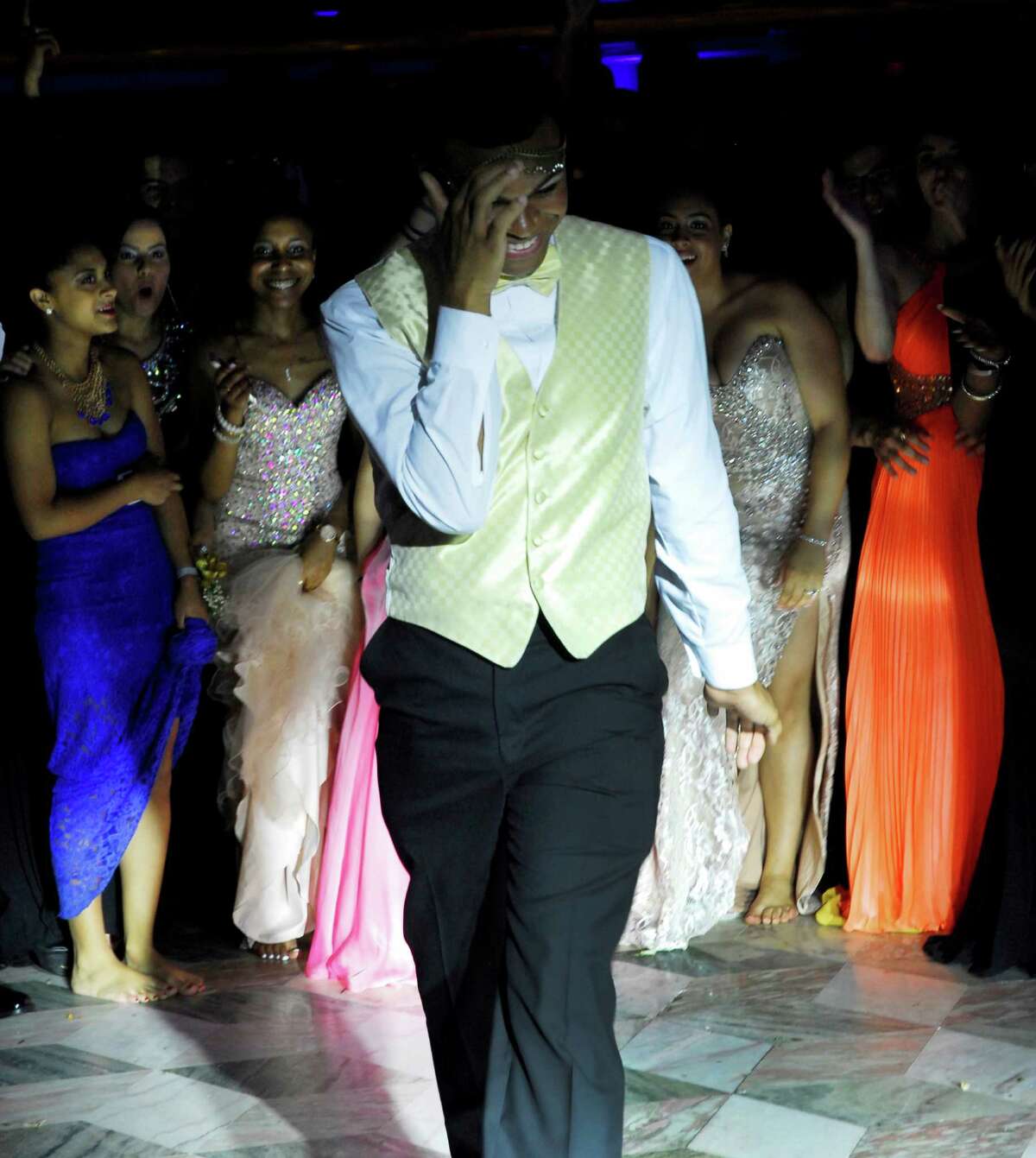 Danbury High's male prom queen greeted with cheers