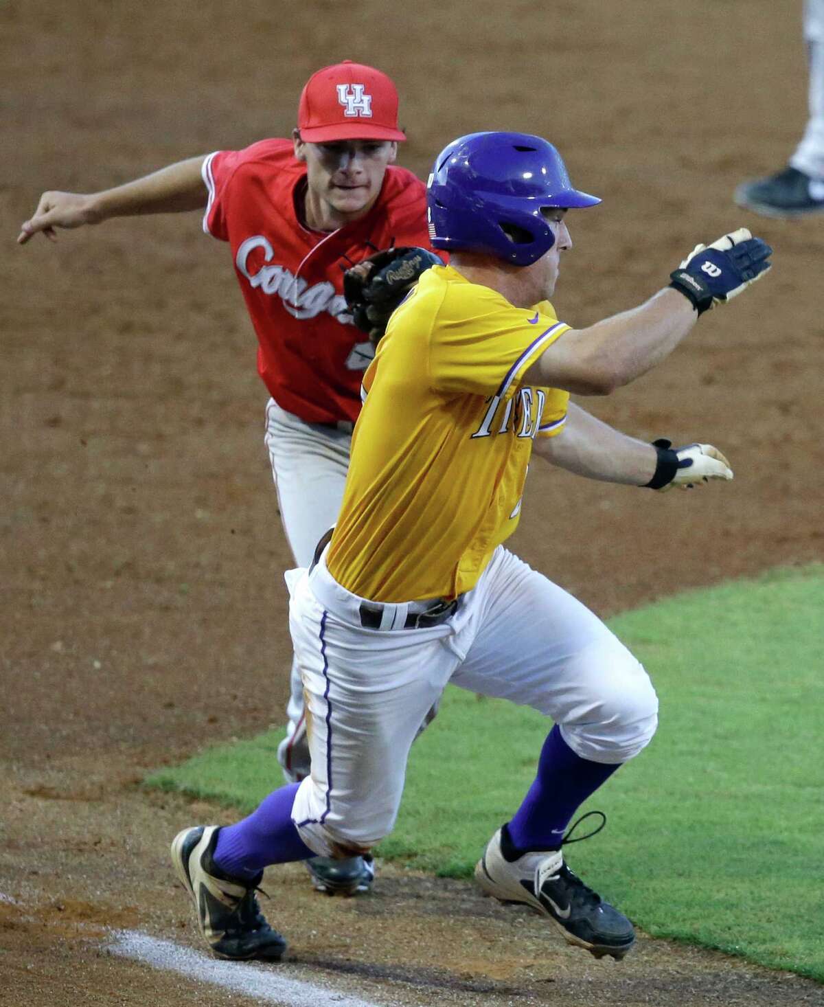 UH double dips to stave off elimination, setup Monday game