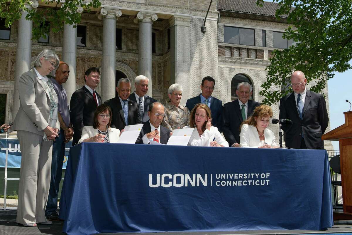With ceremoney, Greenwich developer finalizes UConn deal, husband's legacy