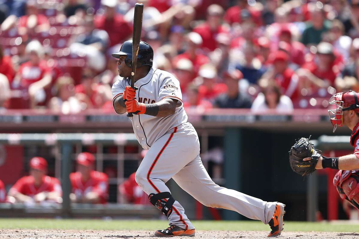 Giants win series from Reds, head home atop baseball world