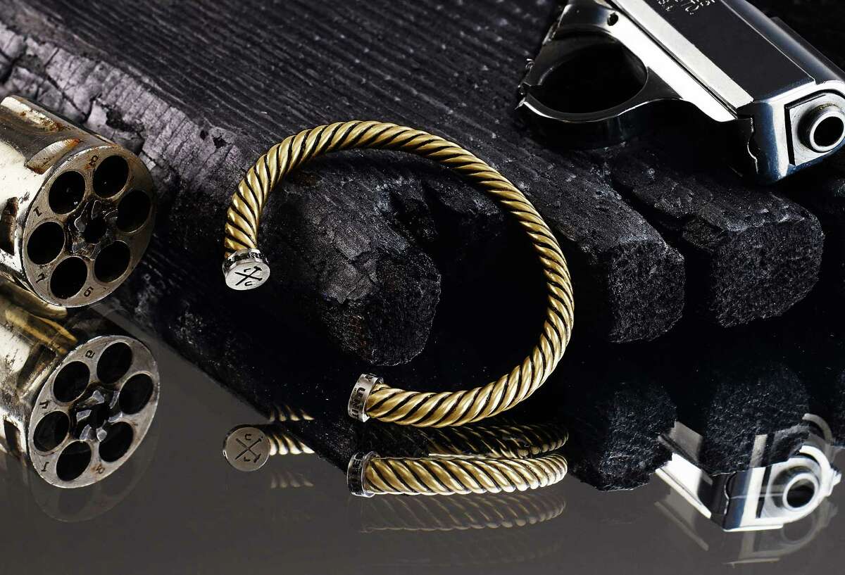 Armani Exchange debuts new cuffs made from illegal guns