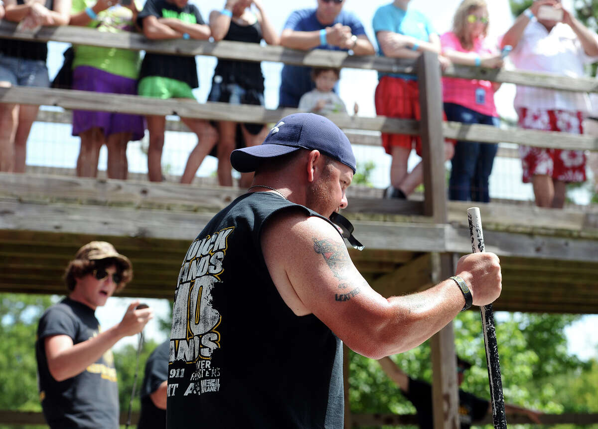 Photos: Gator Country nabs 400 pound monster in Groves