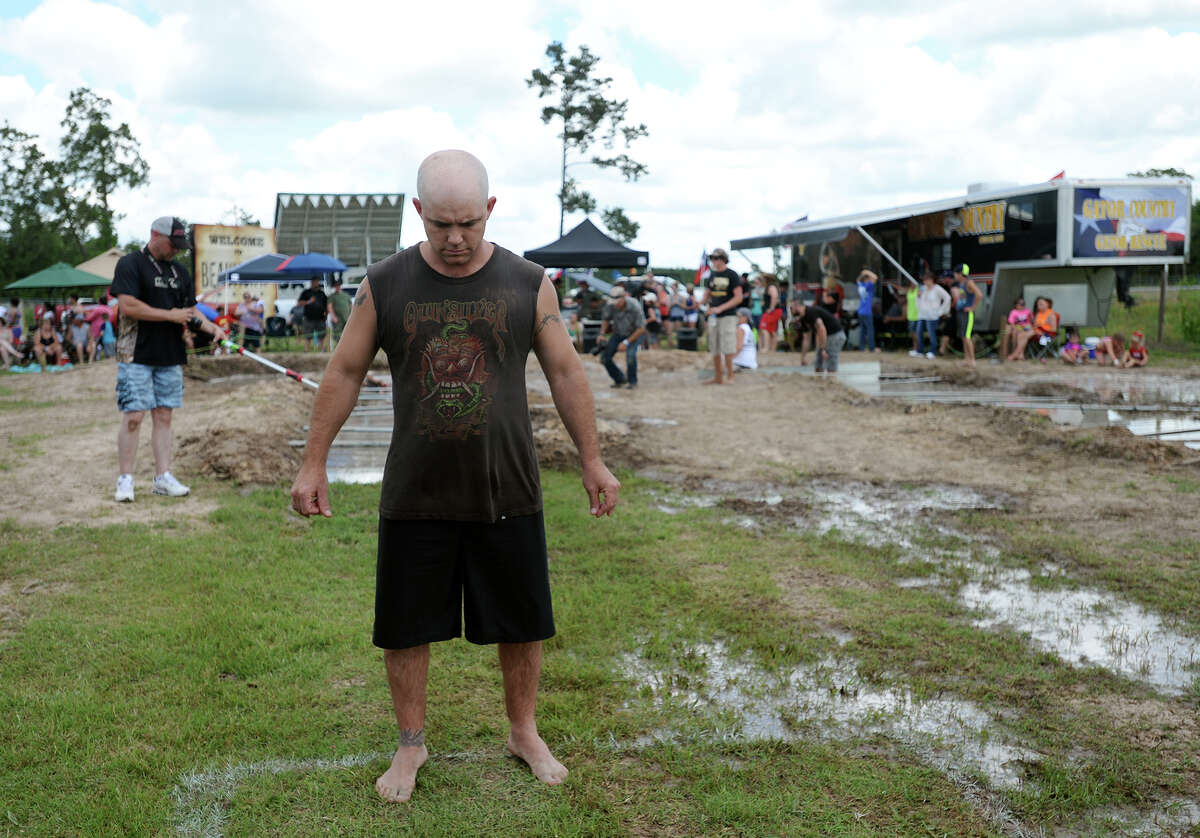 Photos: Gator Country nabs 400 pound monster in Groves