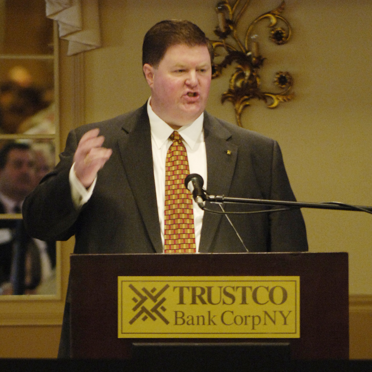 At $2M, TrustCo's McCormick, top paid CEO of local publicly traded cos.