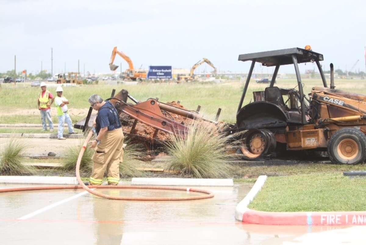 Gas line rupture sparks flames along Gulf Freeway.