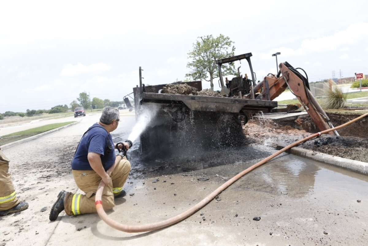 Gas line rupture sparks flames along Gulf Freeway.