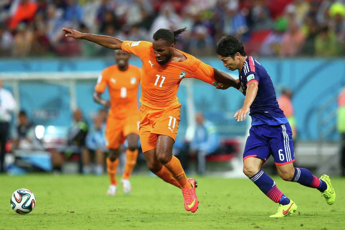 Drogba sparks Ivory Coast's comeback win over Japan