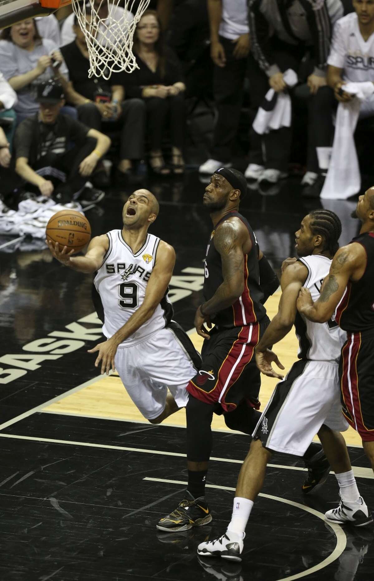 Tony Parker signing autographs, taking photos at Academy
