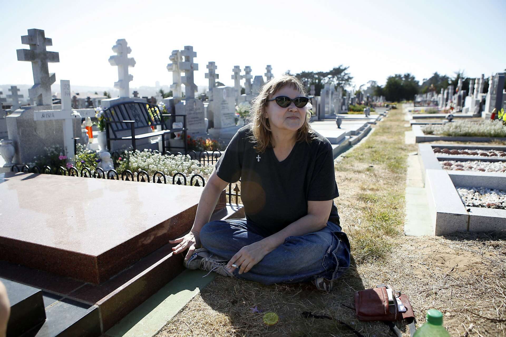 Homeless woman and cat who met in cemetery save each other