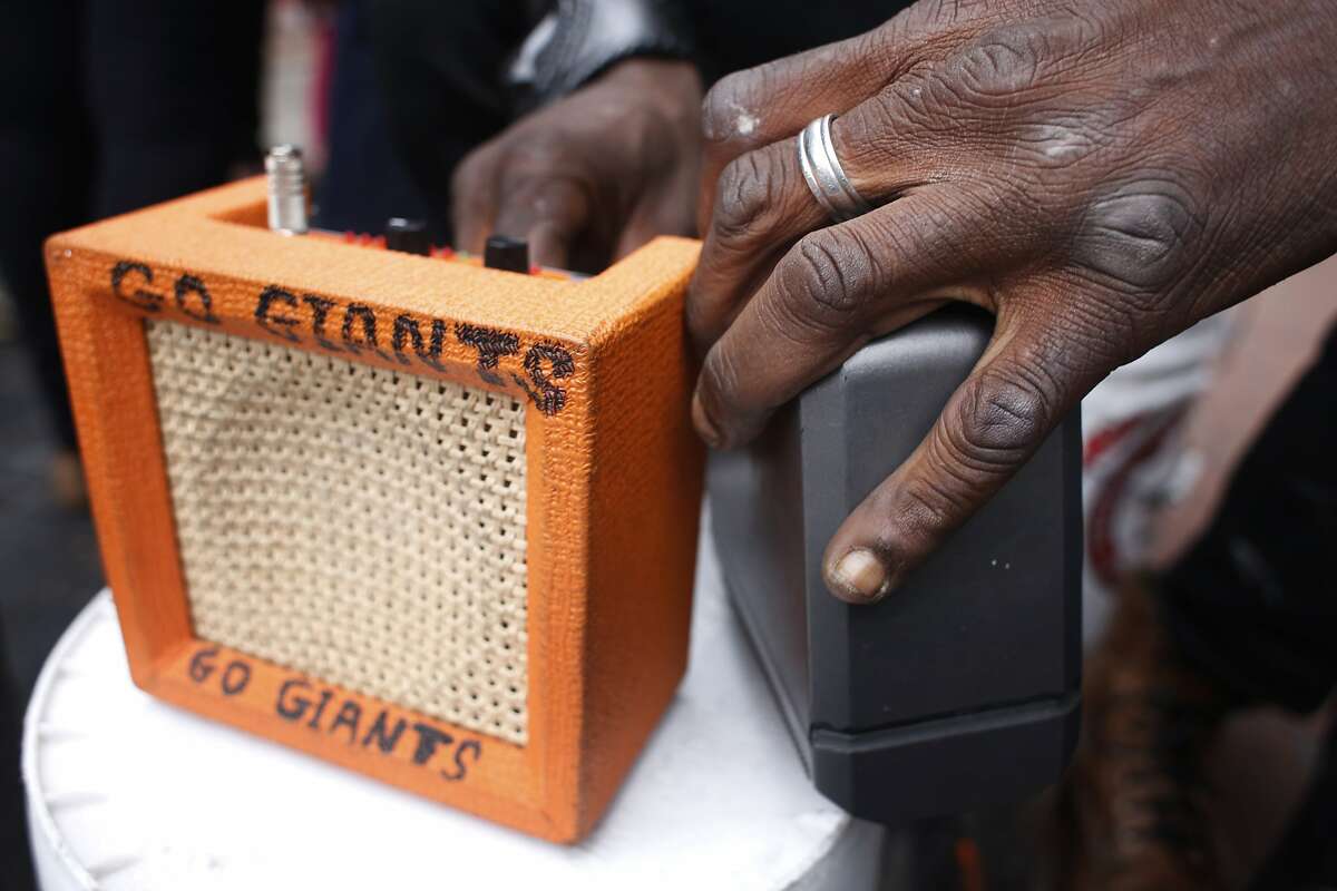 Delta blues harp player gets by with captive audience