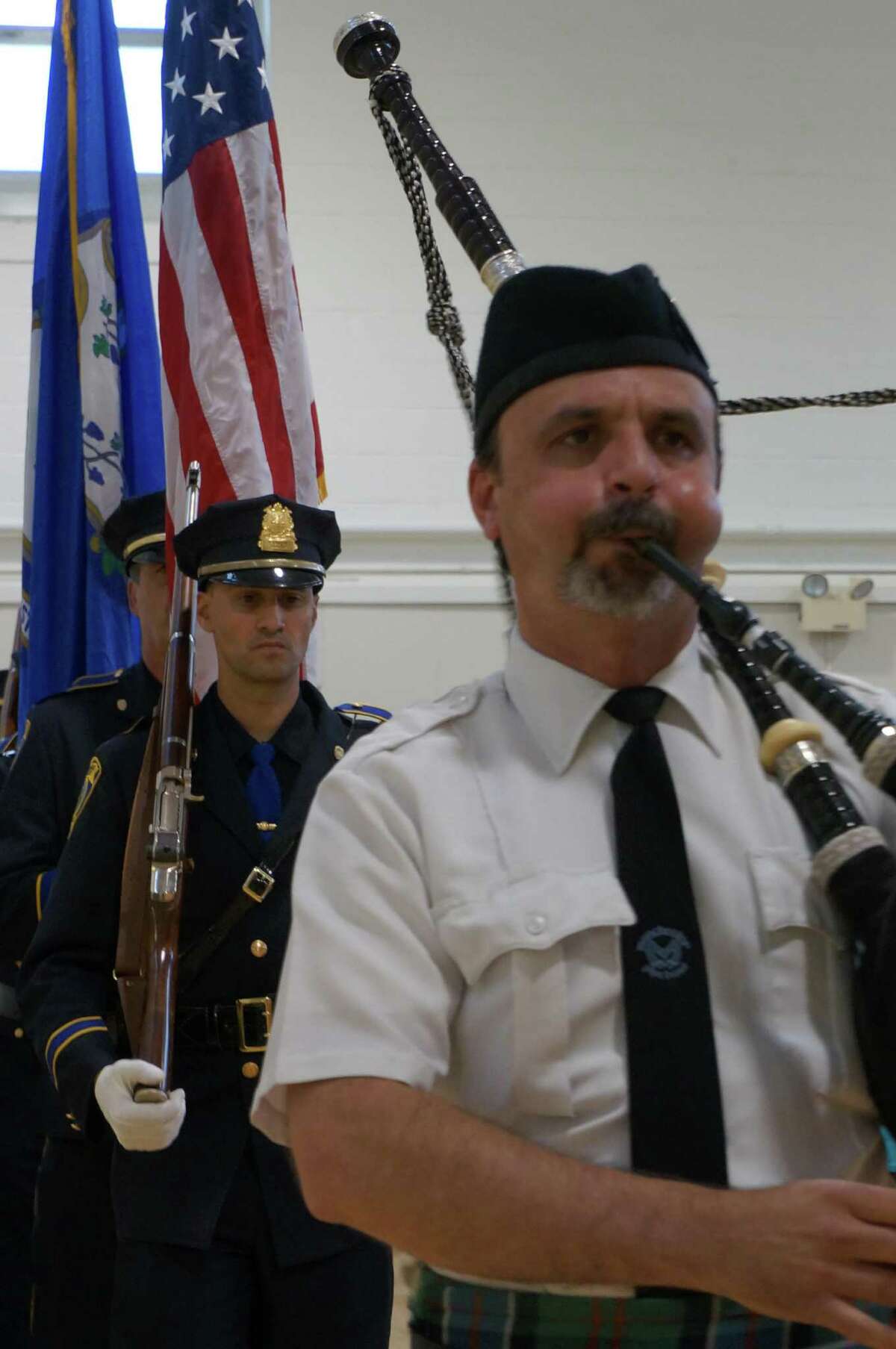 Four police officers saluted at promotions ceremony