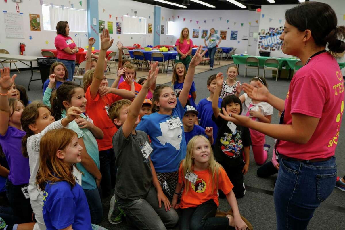 Local kids learn about rescued animals during the Houston SPCA Critter Camp